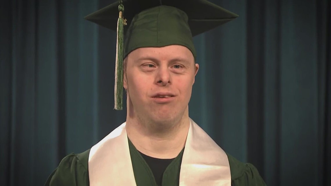Graduate with Down syndrome makes history at Olympia college | king5.com