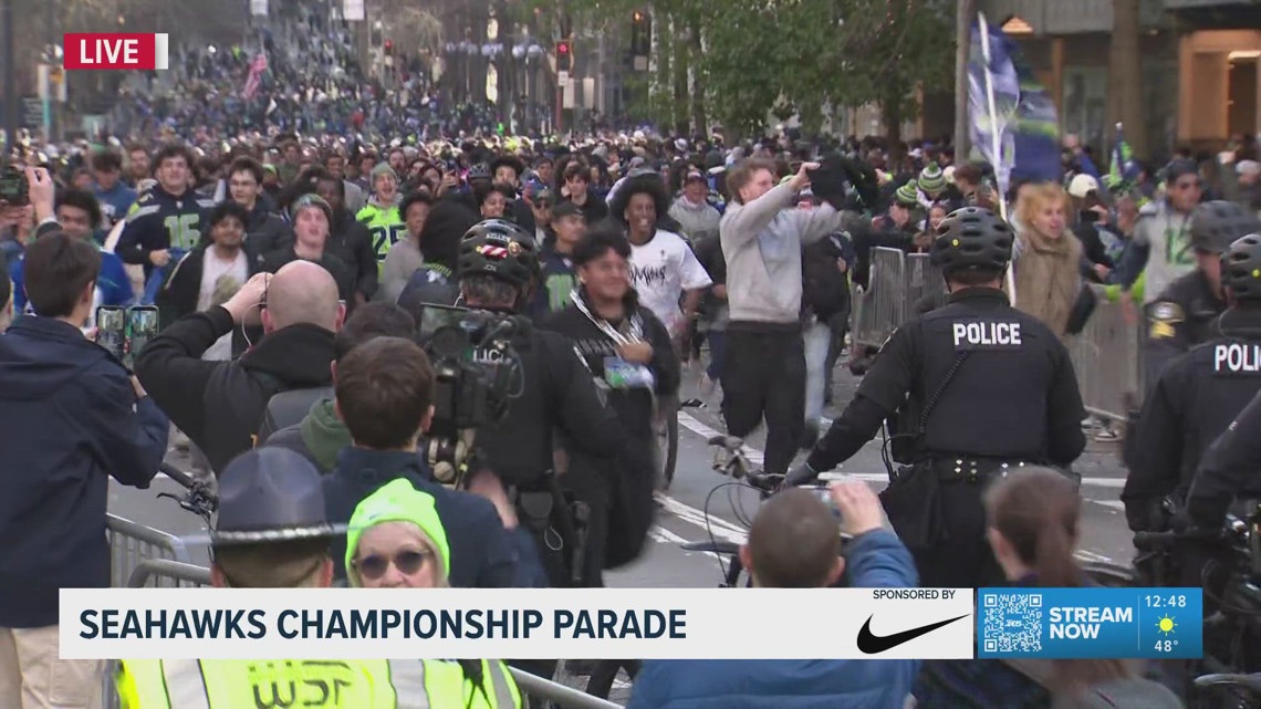 Huge crowd surges on Seahawks parade route; officers work to keep route ...