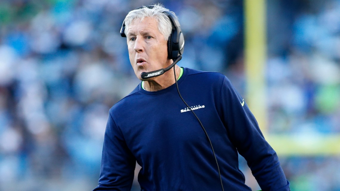 Seahawks clinch playoff spot and move into top of NFC after a wild ...
