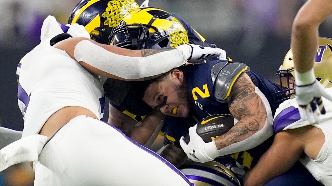 Washington loses 34-13 to Michigan in national championship game ...
