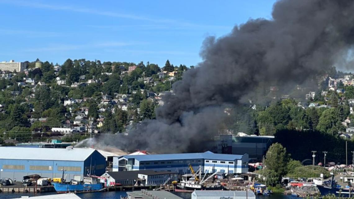 Over 100 firefighters battle large commercial warehouse fire in Ballard ...