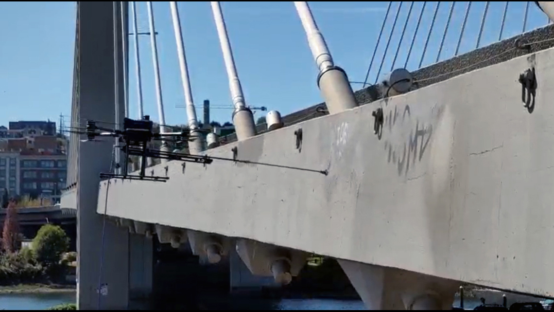 WSDOT officially testing drones to cover up graffiti on bridges and ...