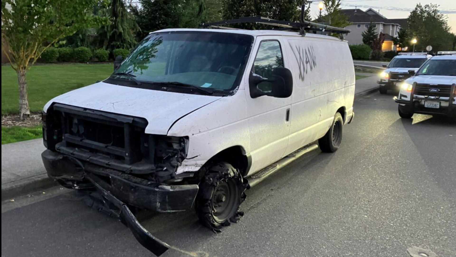 White van with suspicious message on side found abandoned | king5.com