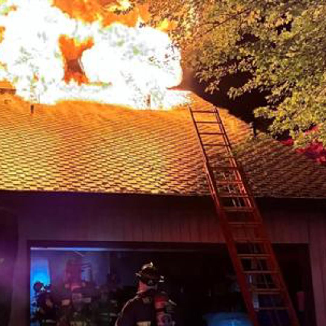 Bellevue condo fire causes roof collapse, forces firefighters out of ...