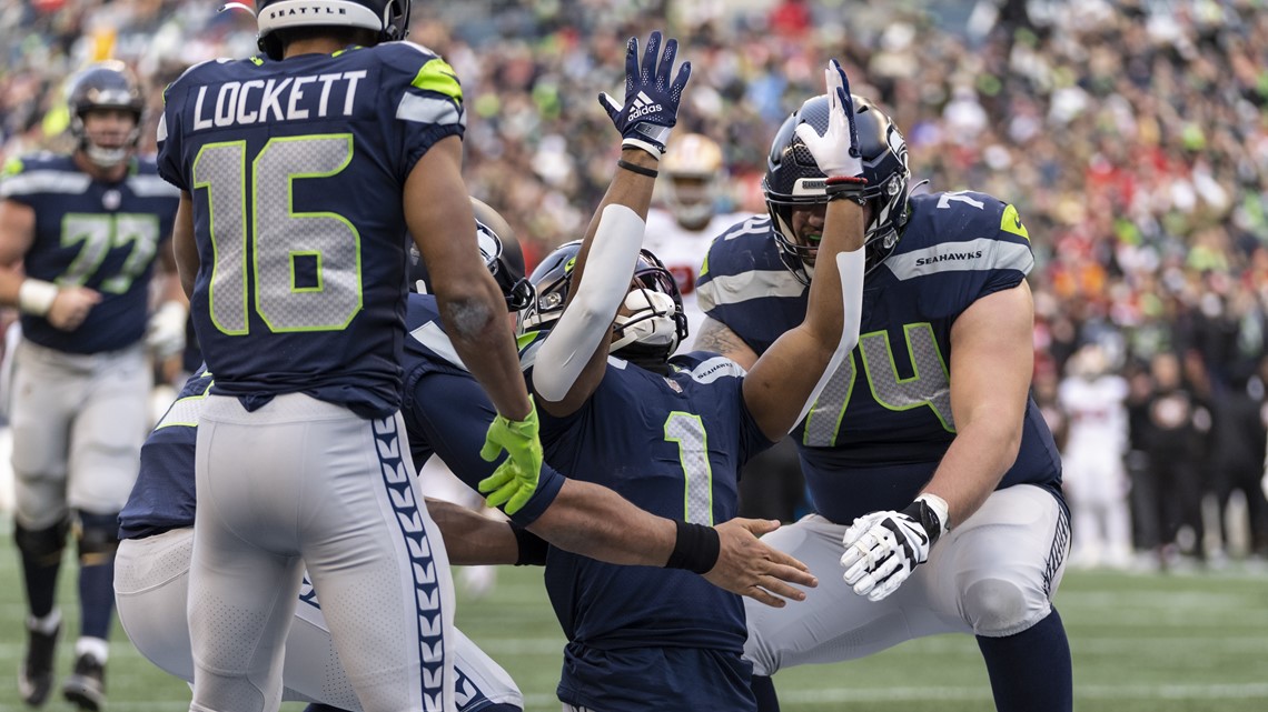 Report: Seahawks restructure Lockett and Eskridge contracts | king5.com