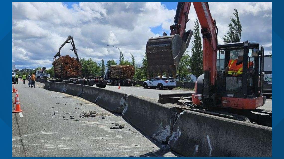Log truck collision damages barriers, blocks lanes on SR 509 near Port ...