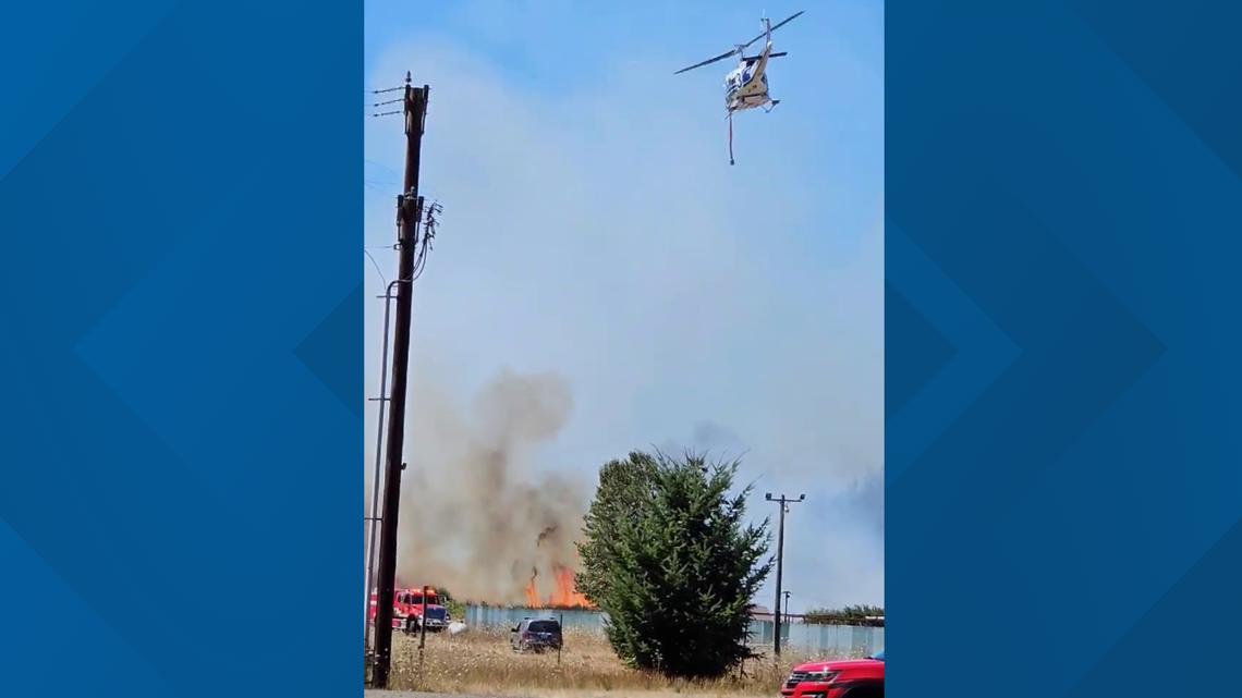 Public urged to avoid area as crews monitor brush fire near Grand Mound ...