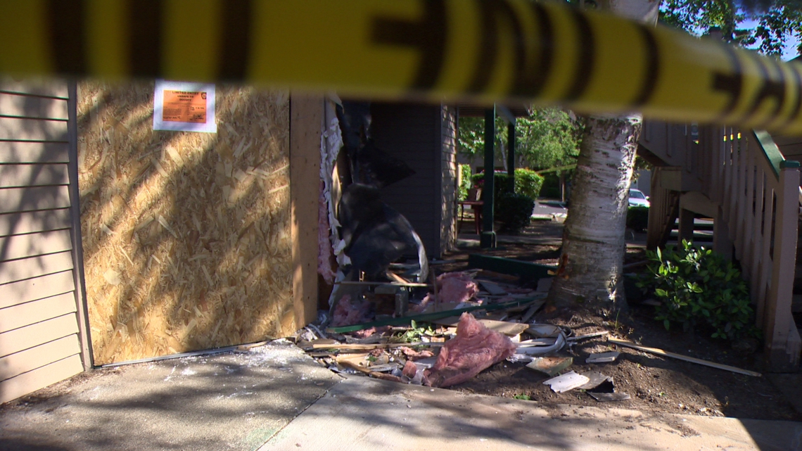 Nine people displaced after car crashes into Des Moines home | king5.com