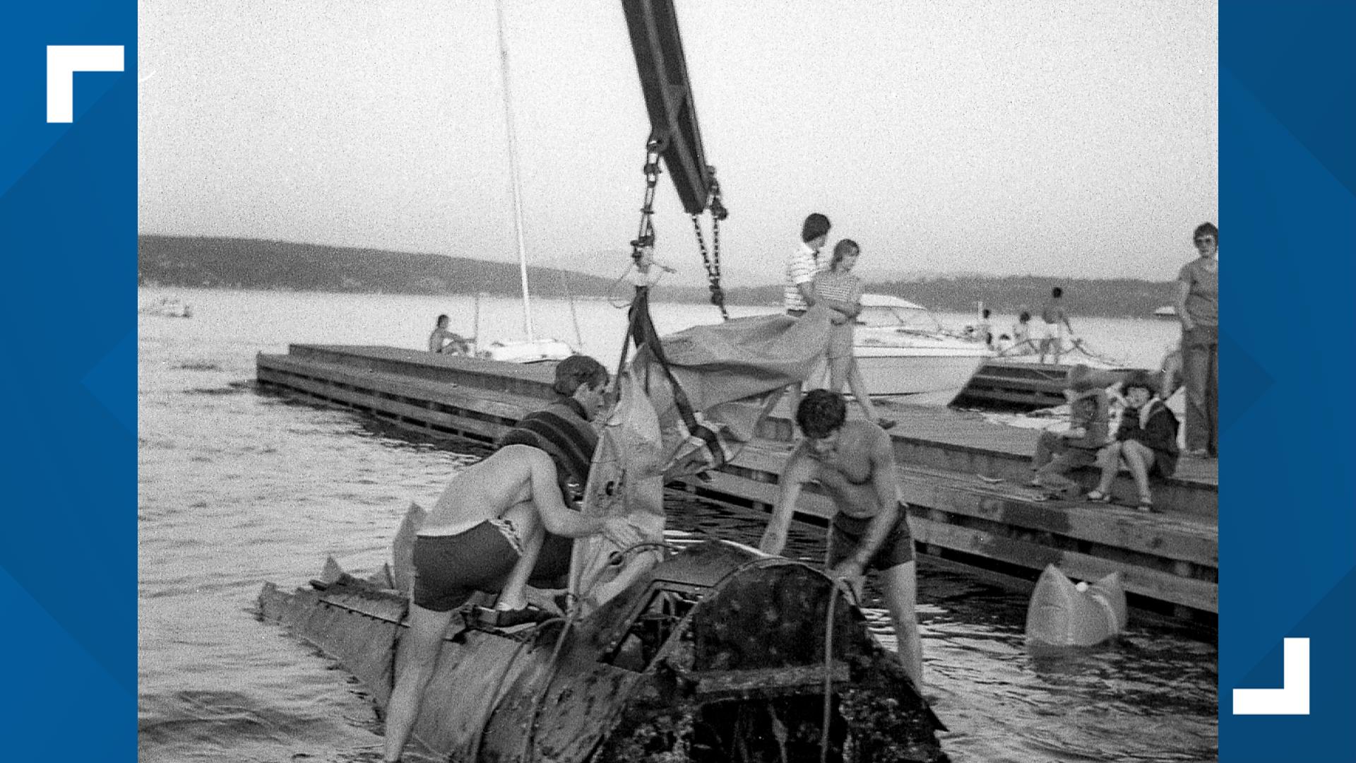 Rare WWII Helldiver takes to skies after decades in Lake Washington ...