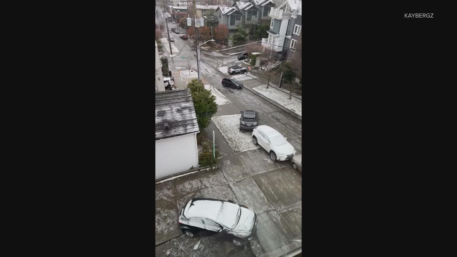 WATCH: Video shows cars sliding down street on Queen Anne in Seattle ...
