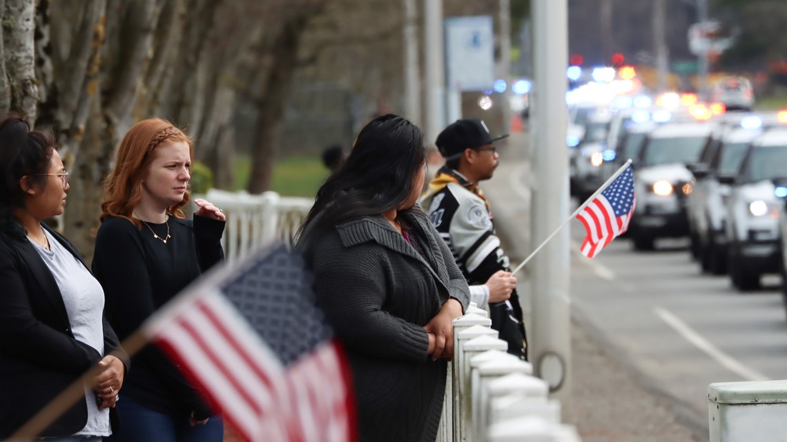 'We wouldn’t be anywhere else': Hundreds line procession route for ...