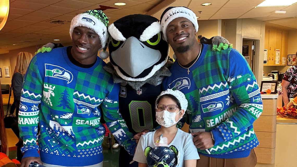 Seattle Seahawks players and mascot Blitz visit Sacred Heart Children's ...