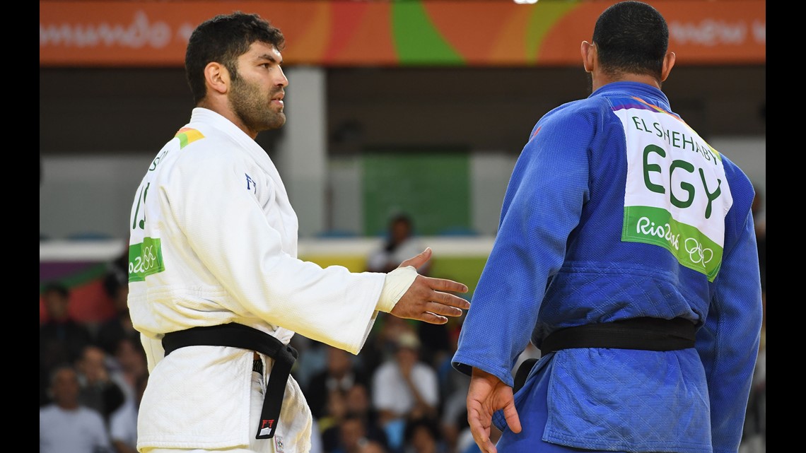 Egyptian judo athlete sent home after refusing to shake hands | king5.com