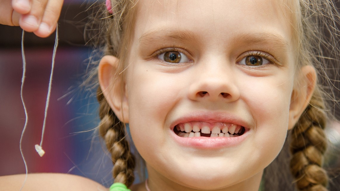 10 epic videos of kids pulling teeth in crazy ways on Tooth Fairy Day ...