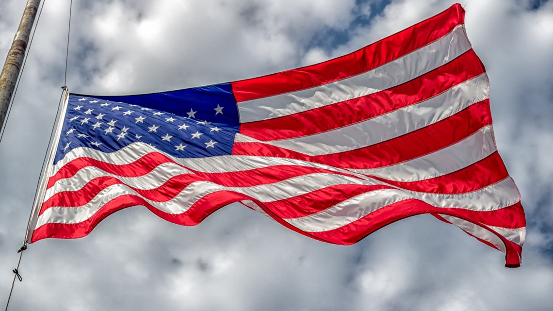 Flag that survived Babb Road Fire in Malden is retired | king5.com