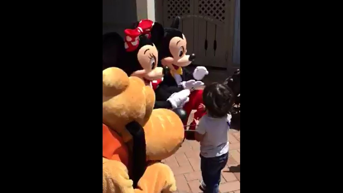 Disney characters communicate with little boy in sign language | king5.com